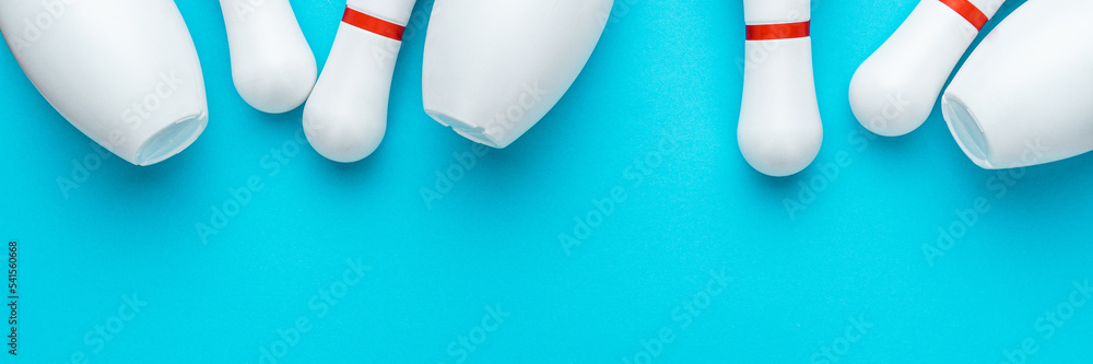Minimalist photo of bowling pins over turquoise blue background. Flat ...