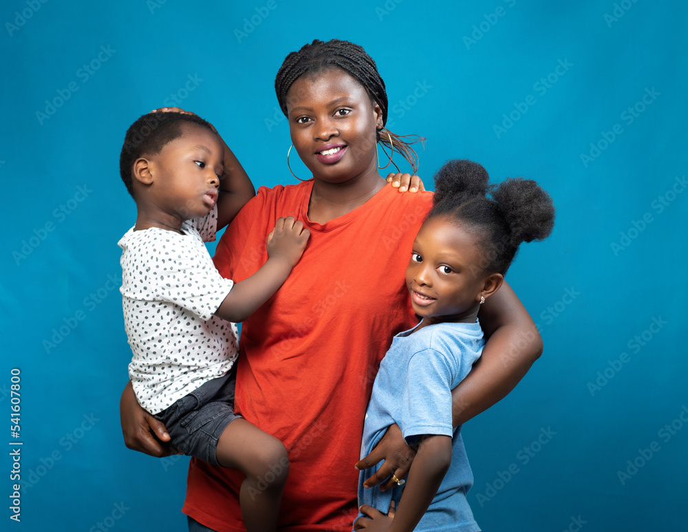 Happy African family from Nigeria consisting of a mother, aunt or ...