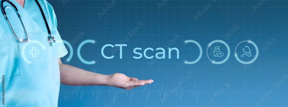 CT scan (computerised tomography). Doctor stretches out hand. Interface ...