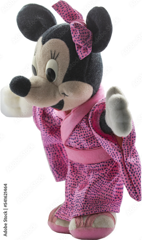 Profile view of Minnie mouse plush toy still life with Japanese costume ...