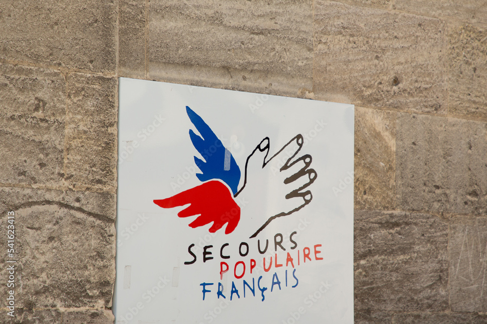 secours populaire français logo sign and brand text on office facade of ...