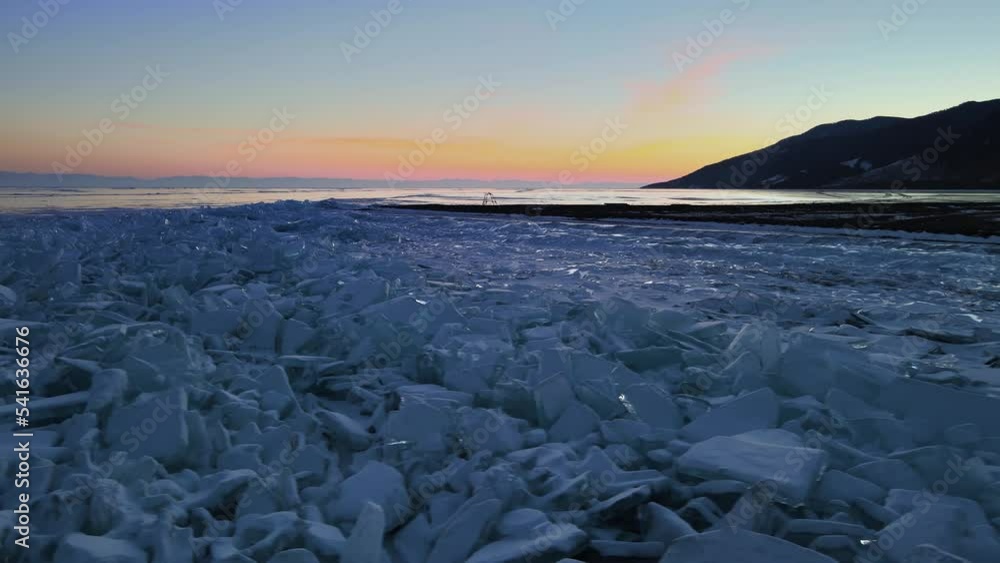 Movement from left to right along a field of ice hummocks on Lake ...