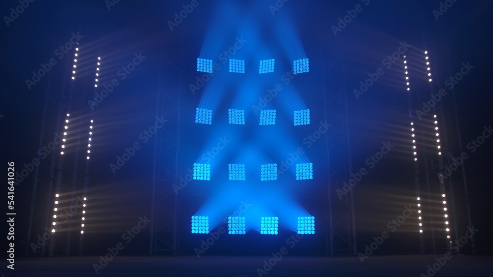 Stage light rays and smoke on empty dark concert scene. Lighting and ...