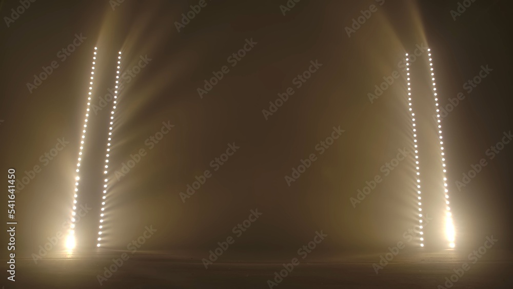 Beams of side spotlights with white soft light illuminating a dark ...