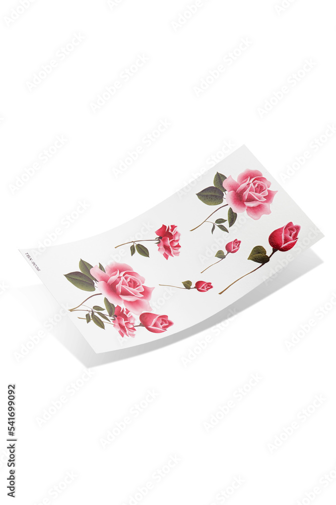 Close-up shot of a sheet of 6 beautiful colored temporary rose tattoos ...