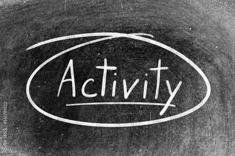 White chalk hand writing in word acitivty and circle shape on ...
