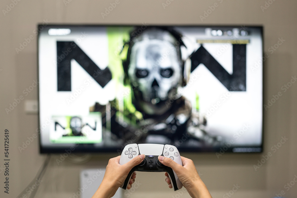 Thailand - October 2022: A gamer is controlling Playstation 5 dualsense ...