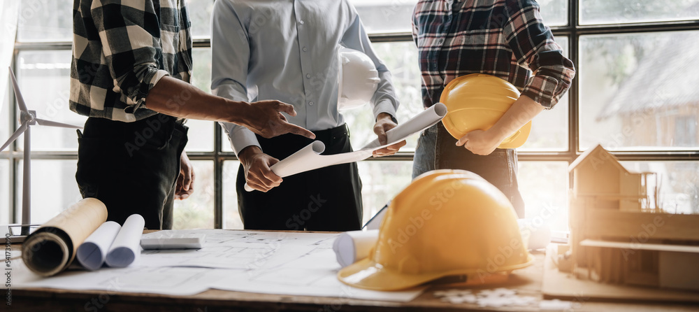 Civil engineer teams meeting working together wear worker helmets ...