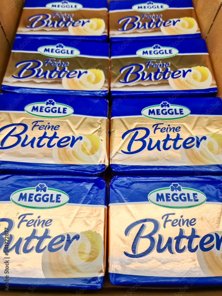 Kiel, Germany - 03. October 2022: Many golden packets of Meggle brand ...