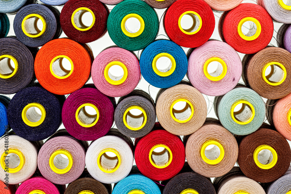 set of multi-colored spools of thread for sewing Stock Photo | Adobe Stock