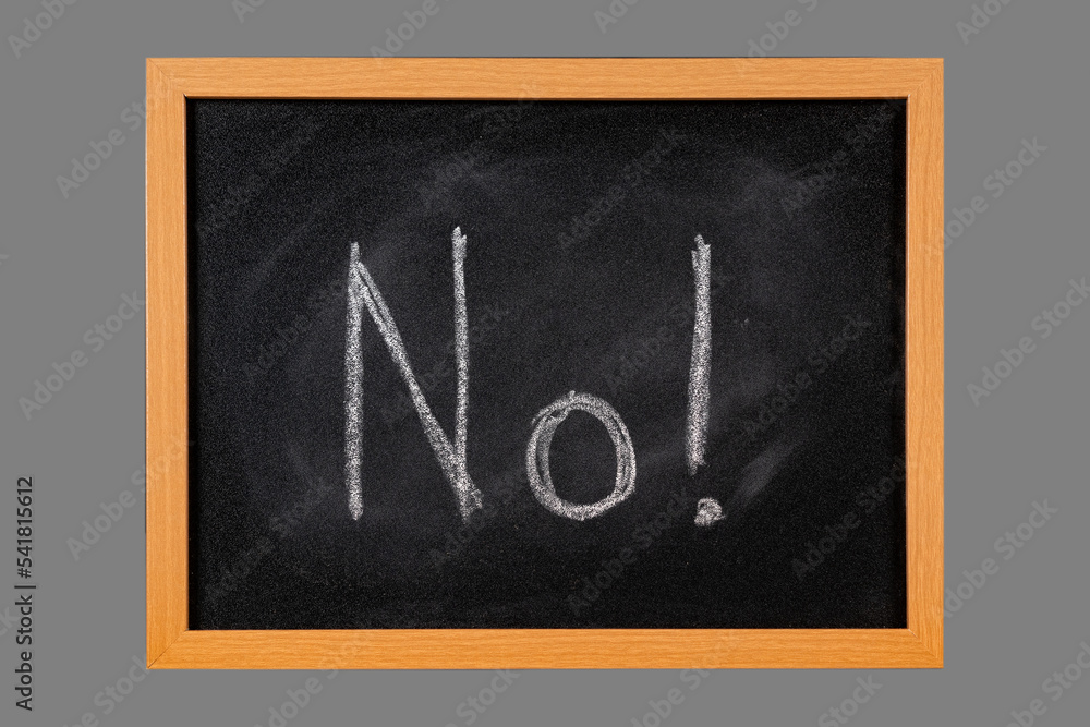 The word No handwritten with white chalk on blackboard with wooden ...