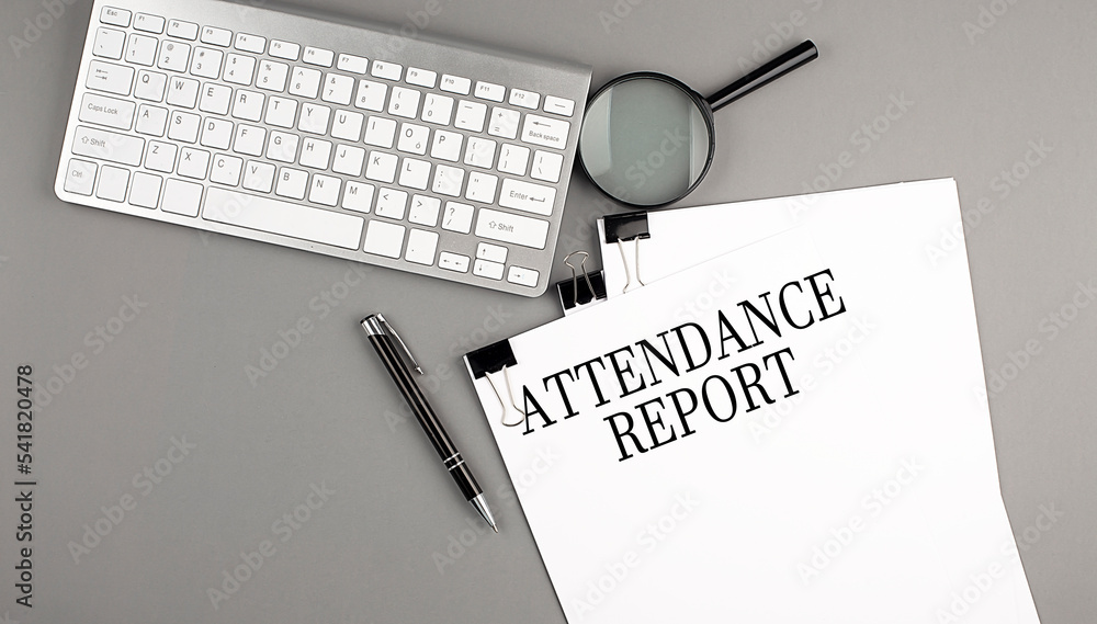 ATTENDANCE REPORT text on paper with keyboard on grey background Stock ...