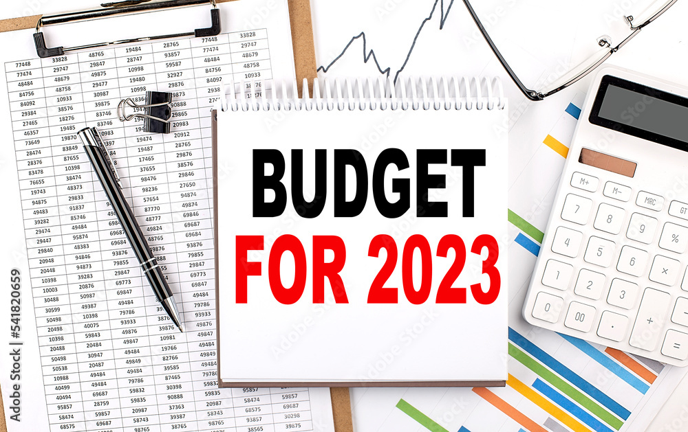 BUDGET FOR 2023 text on notebook with chart, calculator and pen Stock ...