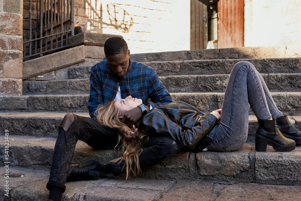 Romantic couple on steps. Stock Photo | Adobe Stock