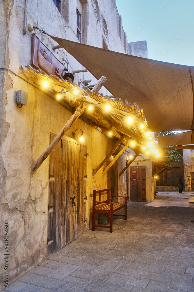 Old Dubai buildings and traditional Arabian street night view ...