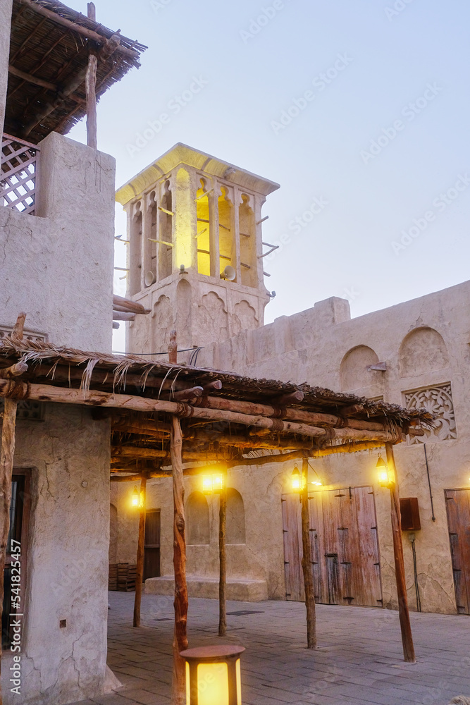 Old Dubai buildings and traditional Arabian street night view ...