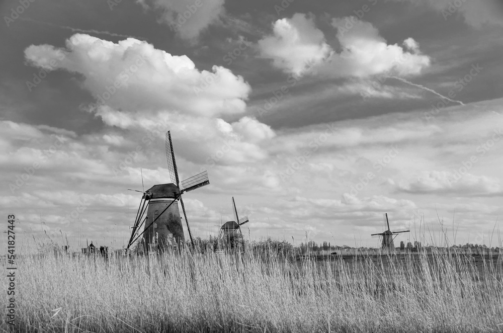 windmill in the field Stock Photo | Adobe Stock