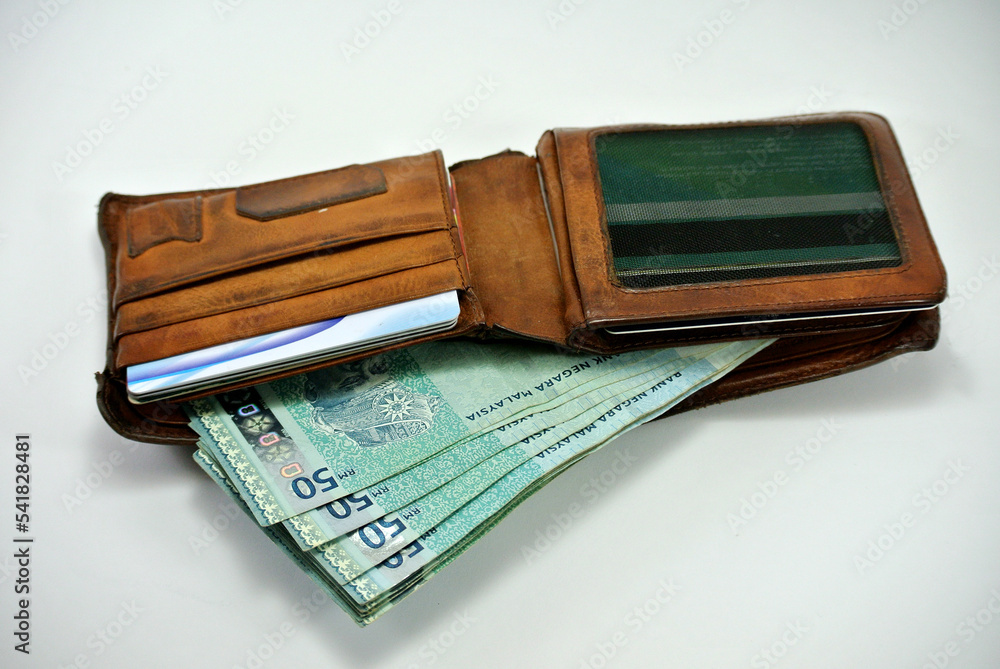 JOHOR, MALAYSIA -MAY 02, 2016: Several pieces of 50 Malaysian Ringgit ...