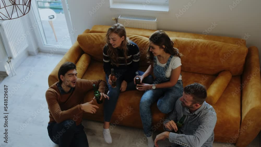 Upper shot of friends talking Stock Video | Adobe Stock