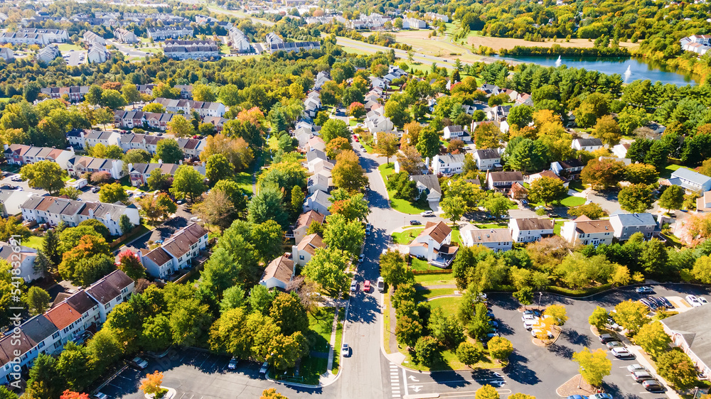 Aerial view of upscale residential area, gated community street real ...