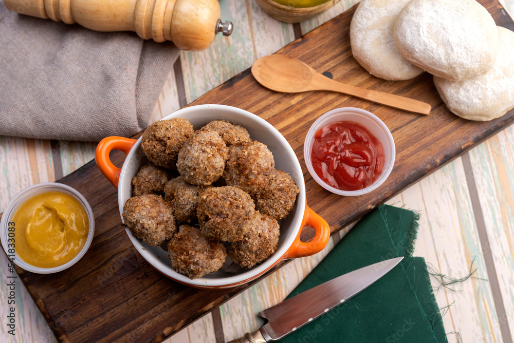 small homemade fried meat meatballs for cold buffet with sauces on ...