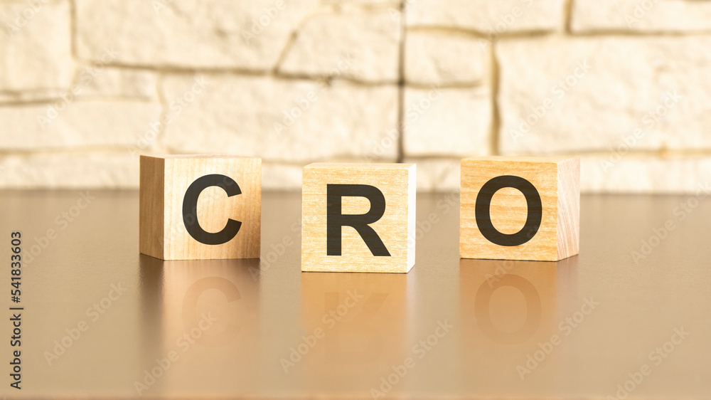 CRO text from wooden blocks on a gray stone background. Stock Photo ...