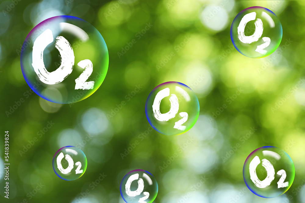 O2 molecules in bubbles and blurred view of green background. Oxygen ...