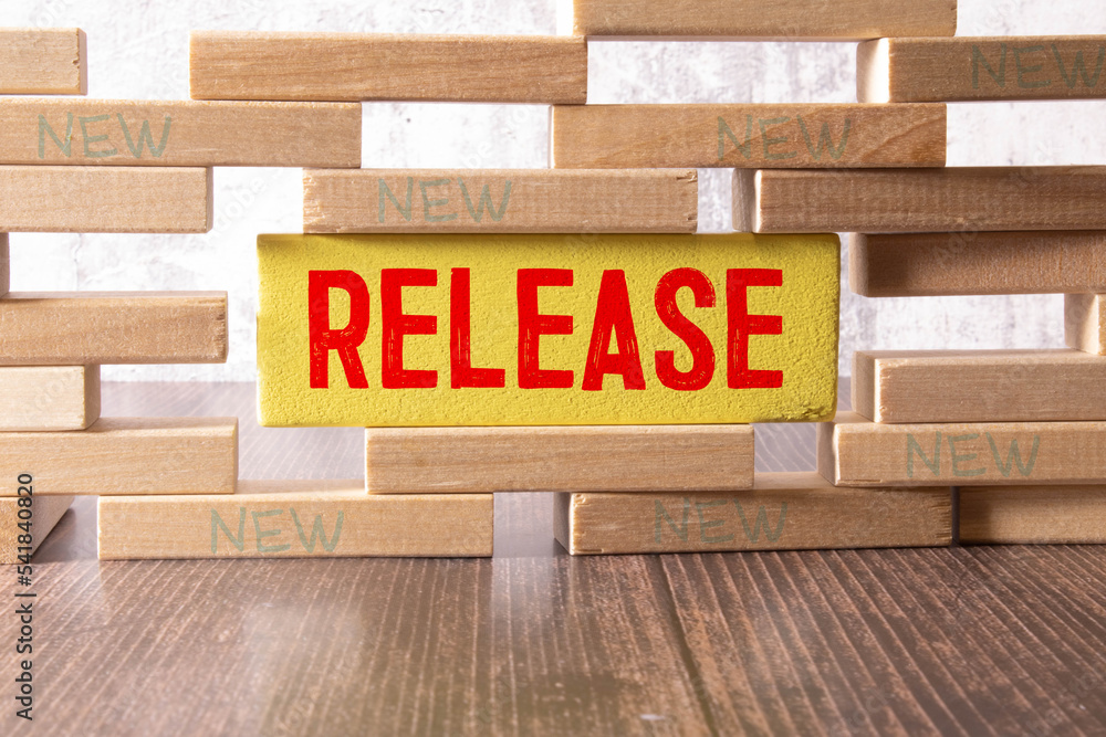 The word release written on wood cubes. Business and finance concept ...