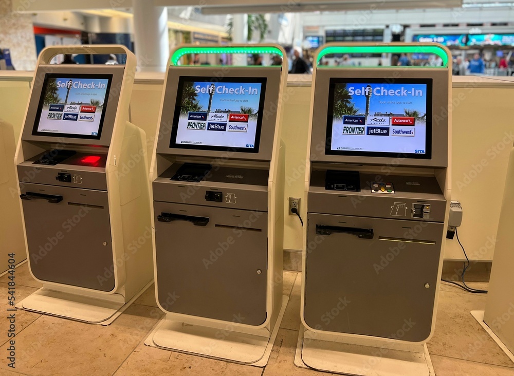 Self check-in kiosks at Orlando International Airport (MCO) in Florida ...