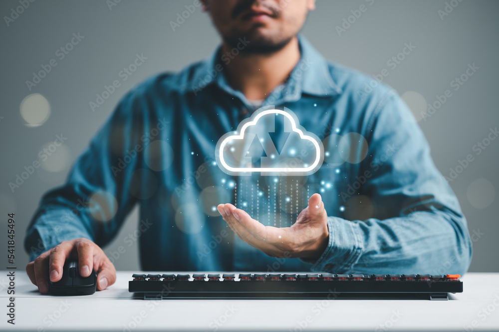 Hand holding virtual cloud computing to transfer data information and upload download ...