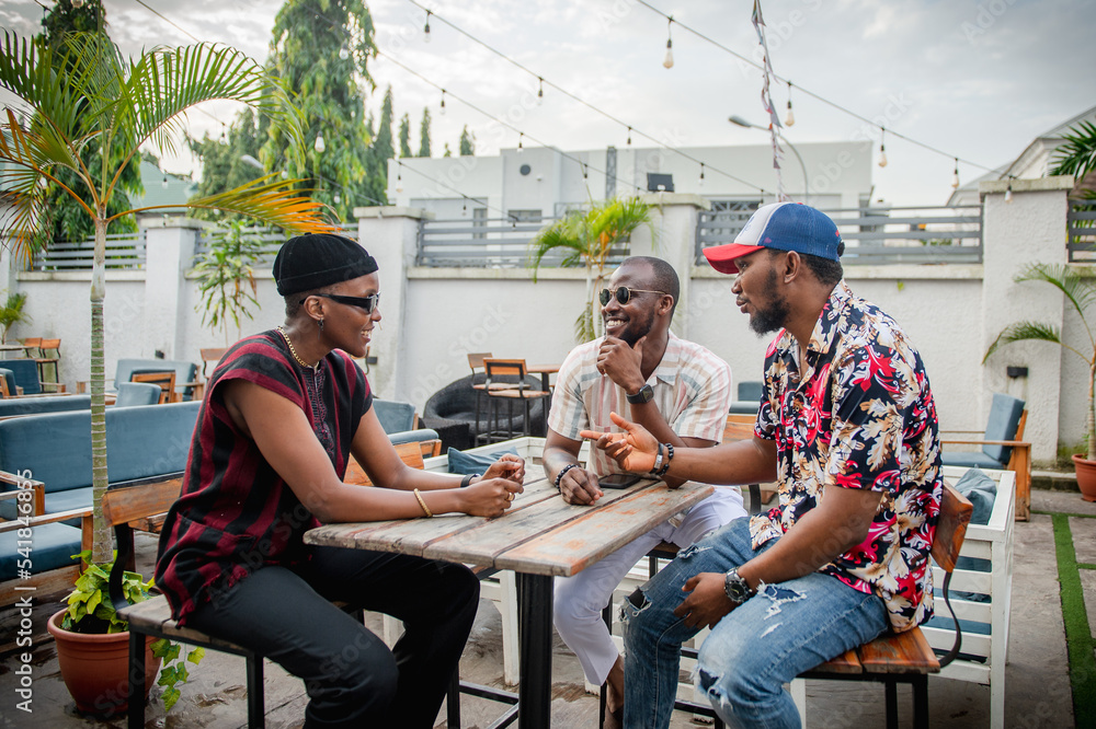 friends having a discussion Stock Photo | Adobe Stock