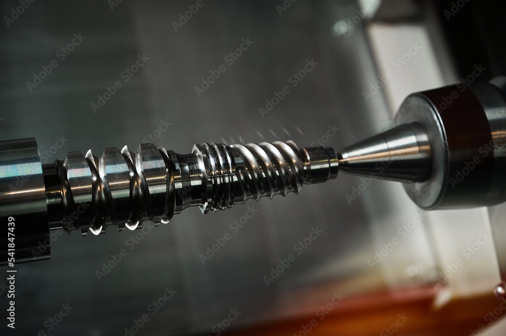 Milling machine tool operates with metal workpiece at plant Stock Photo ...