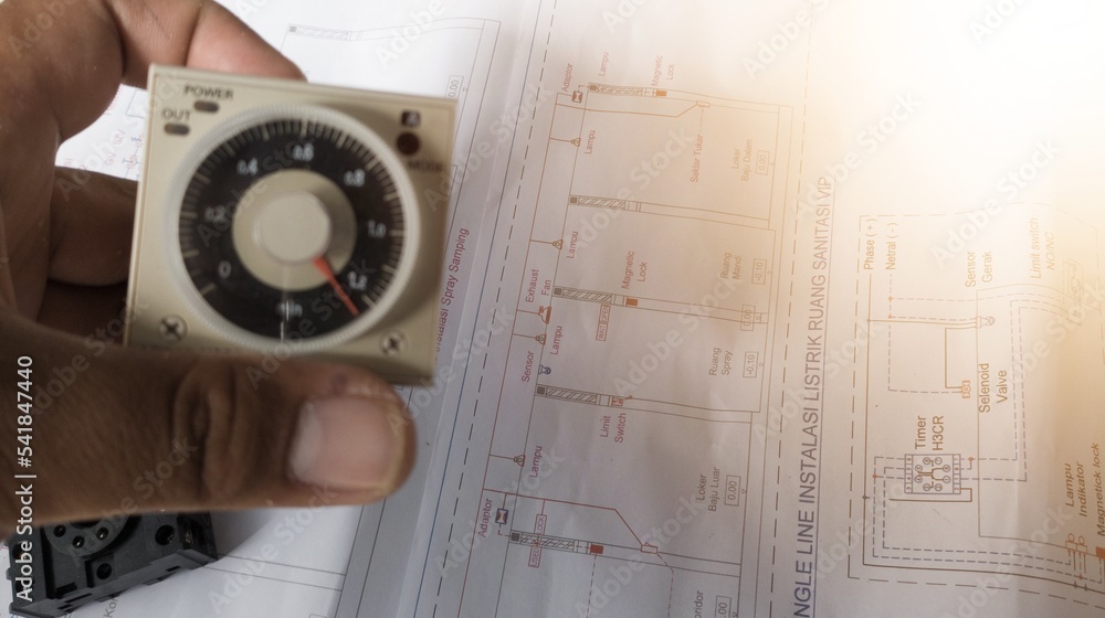 The close up Electric timer with electric diagram background. Stock ...