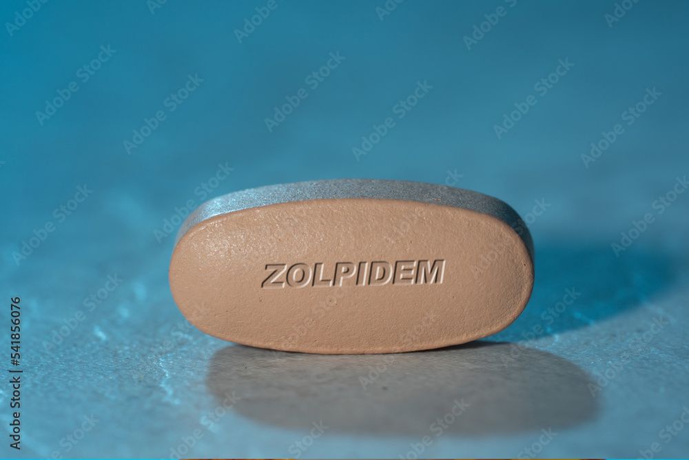 Zolpidem drug Pill Medication ob blue background Stock-Foto | Adobe Stock