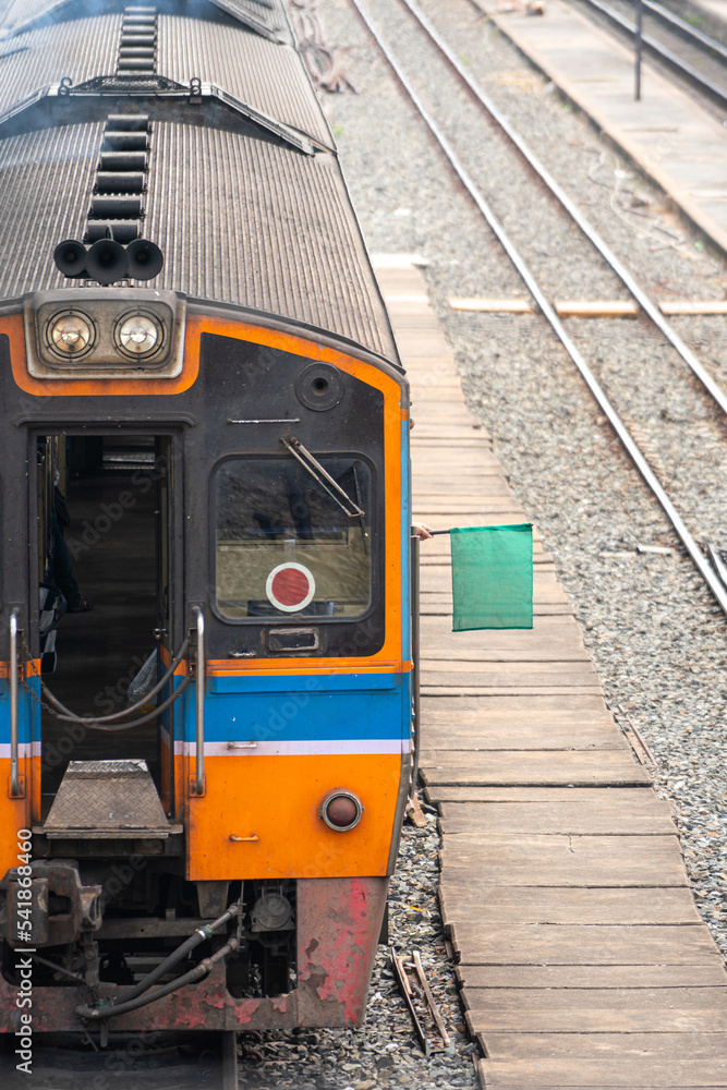 A local passenger train in Thailand is ready to departure from the ...