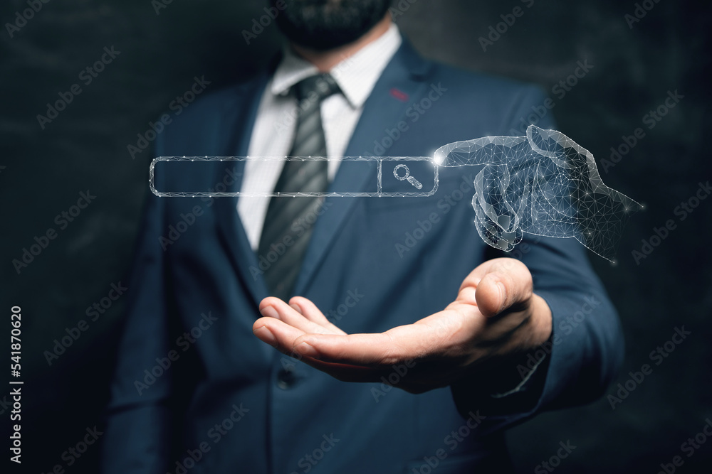 The hand clicks on the search engine from the web. Photos | Adobe Stock