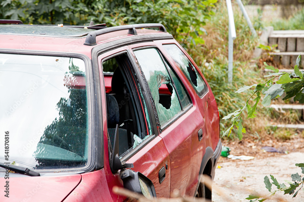 Car with broken windows. A criminal incident. Broken glass window car ...