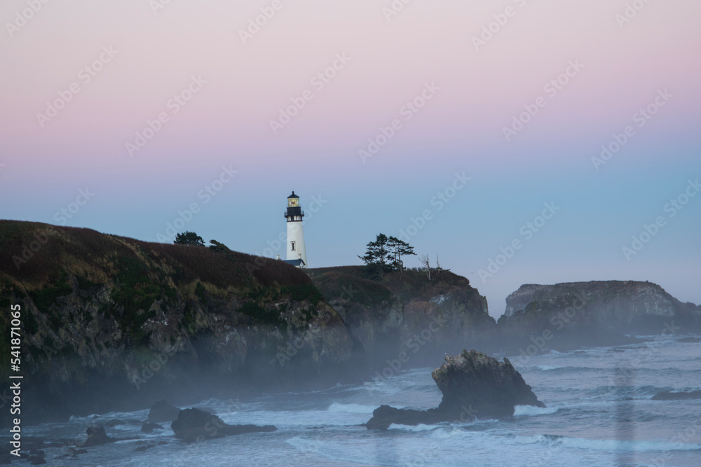 Sunrise at the Yaquina Head Lighthouse in Newport, Oregon. The ...