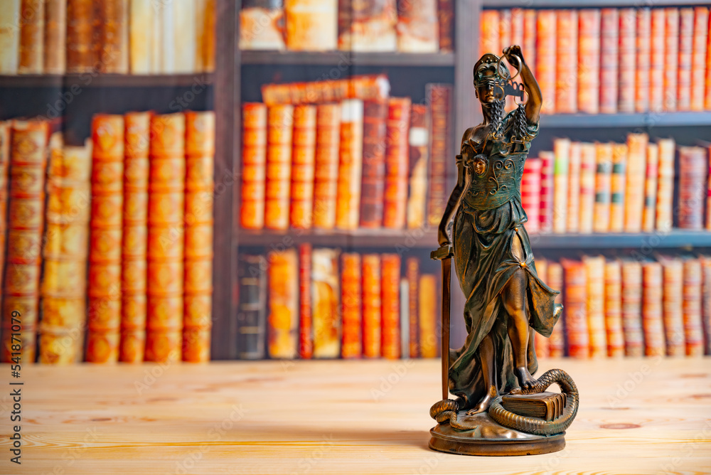 Lawyer office. Statue of Justice with scales close-up against the ...