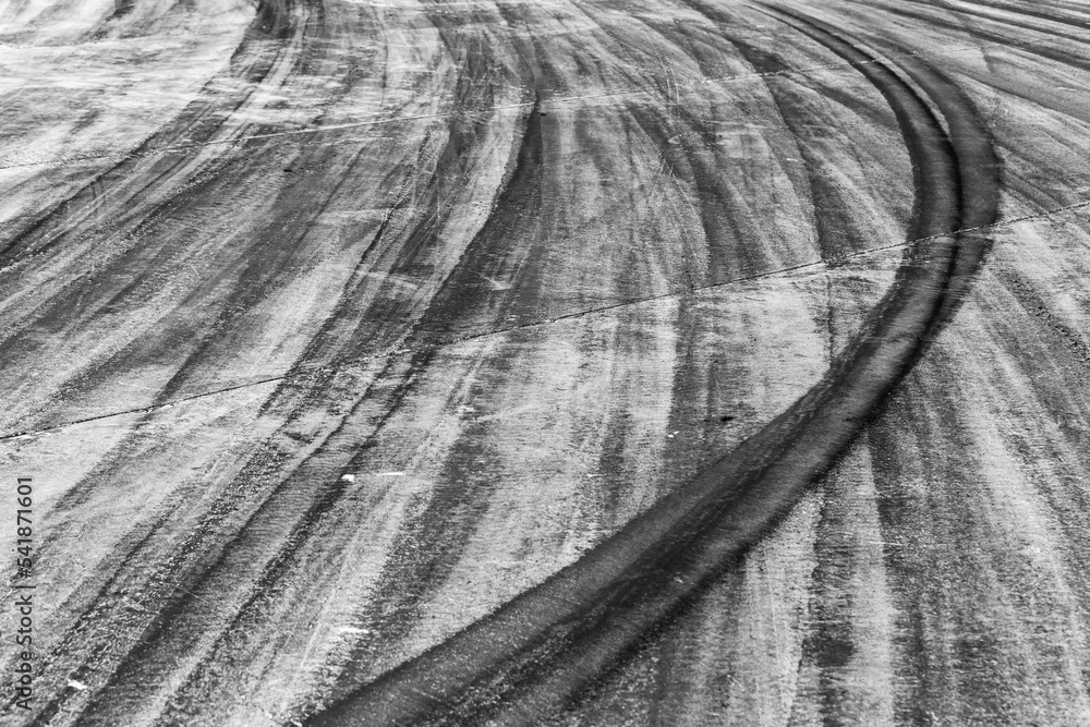 Background with tire marks on road track, Car track asphalt pavement ...