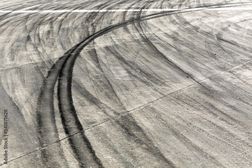 Background with tire marks on road track, Car track asphalt pavement ...