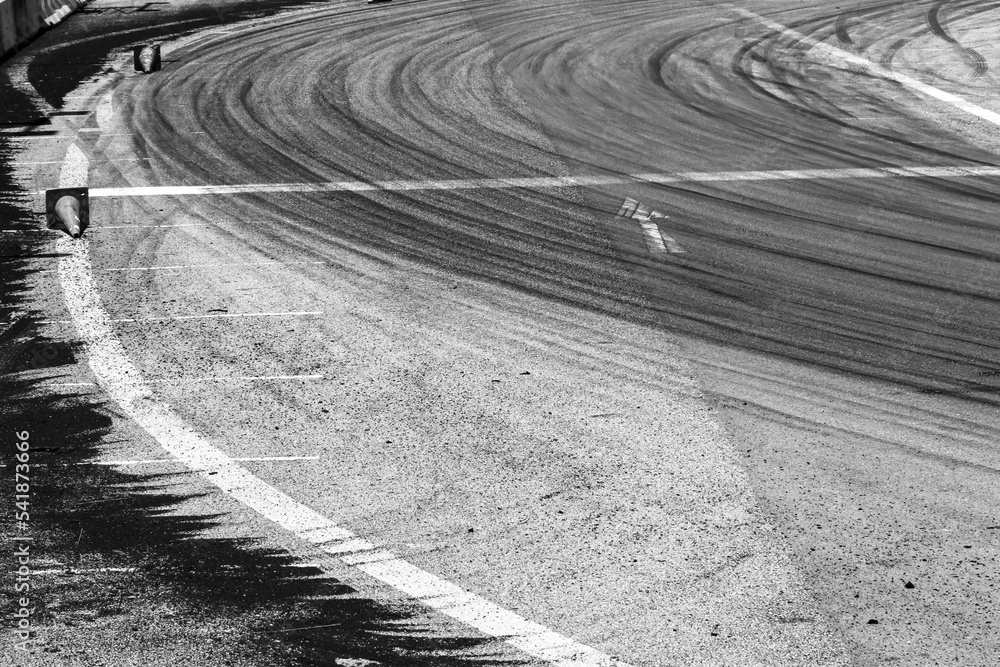 Background with tire marks on road track, Car track asphalt pavement ...