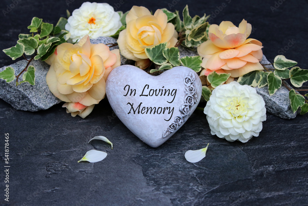 Grave decoration: heart with the words in loving memory. Stock Photo ...