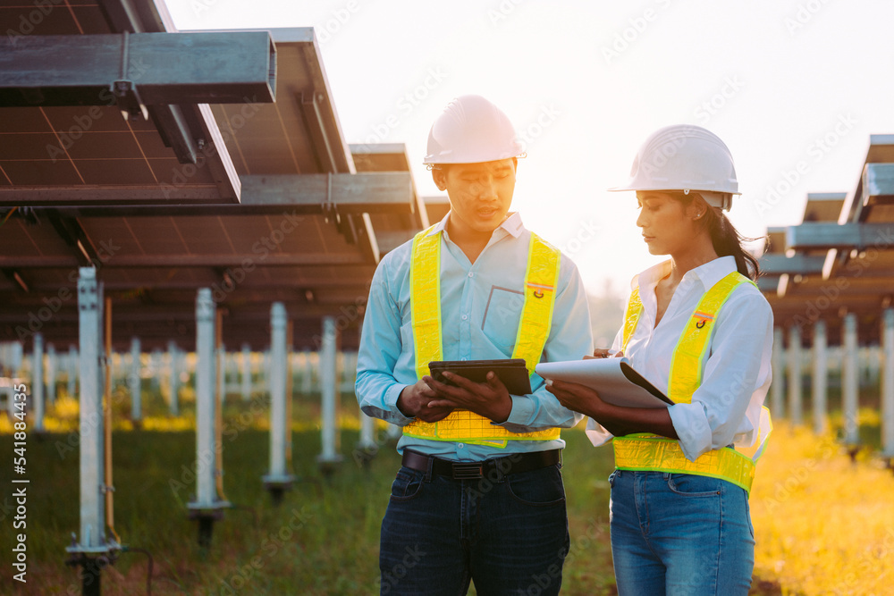 Inspector engineering concept; Engineer inspect solar panel at solar ...