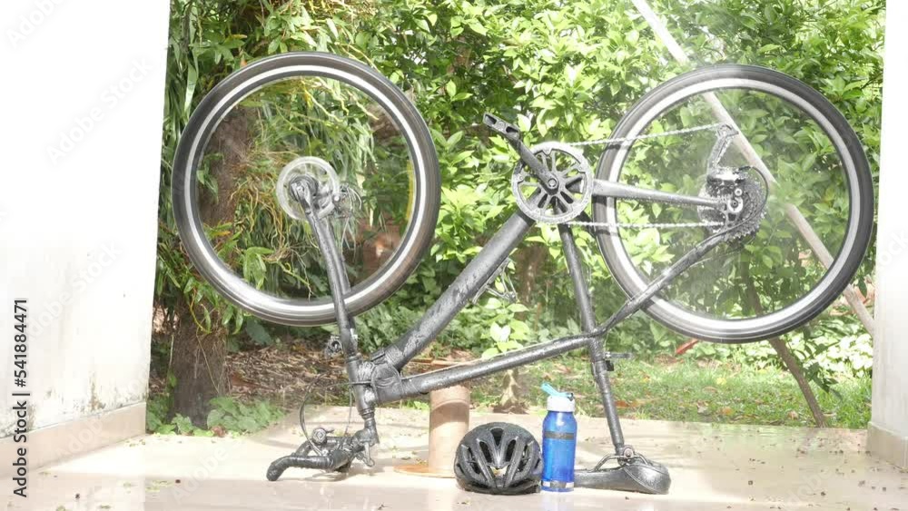 Bike day. Washing a bicycle. Bike wash Stock Video | Adobe Stock