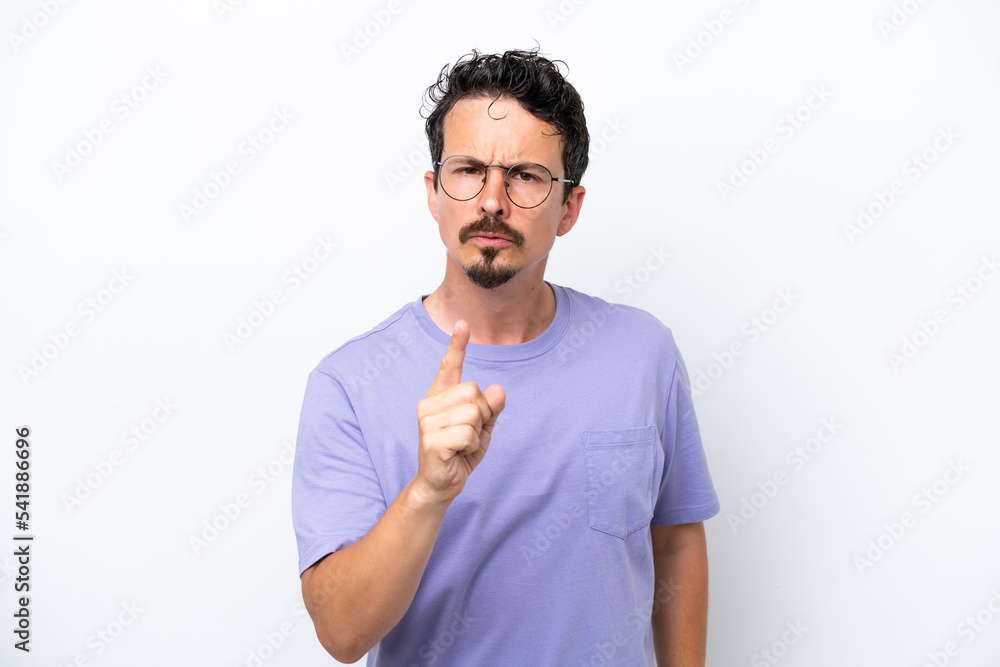 Young man with moustache isolated on white background frustrated and ...