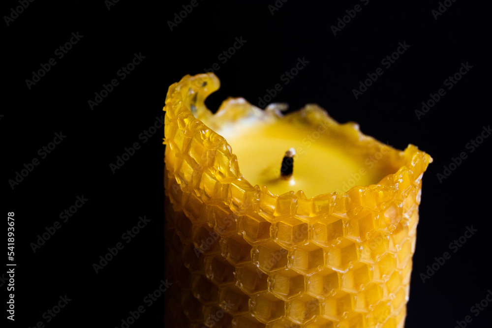 yellow candle on black background, Handmade rolled beeswax candles tied ...