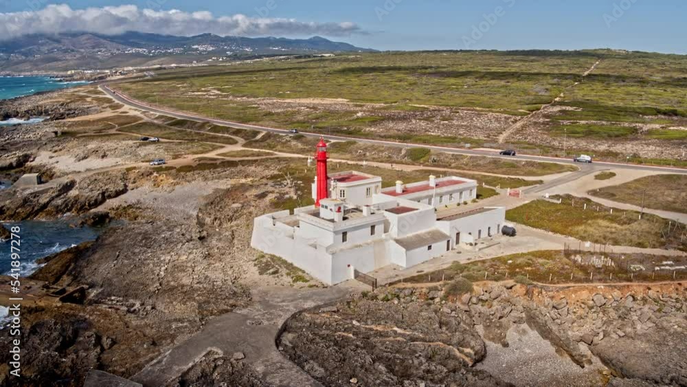 Aerial view away from the Farol do Cabo Raso lighthouse, in Portugal ...