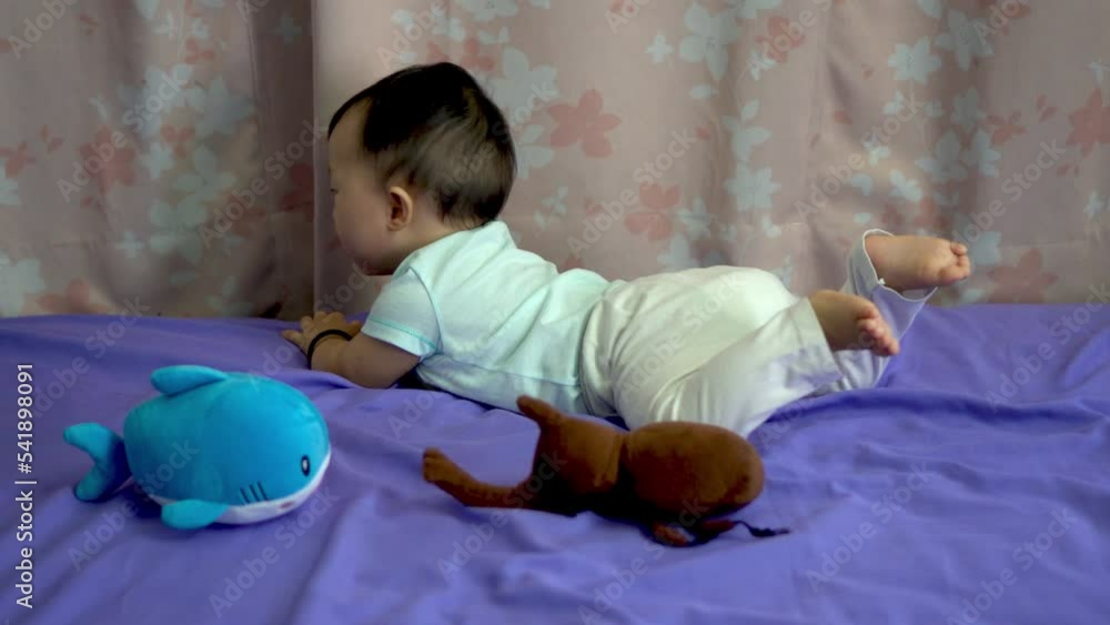 Baby boy crawl at bed. Parenthood, infant, home concept Stock Video ...