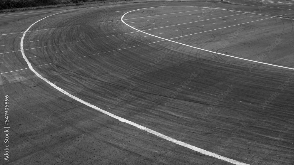 Background with tire marks on road track, Car track asphalt pavement ...